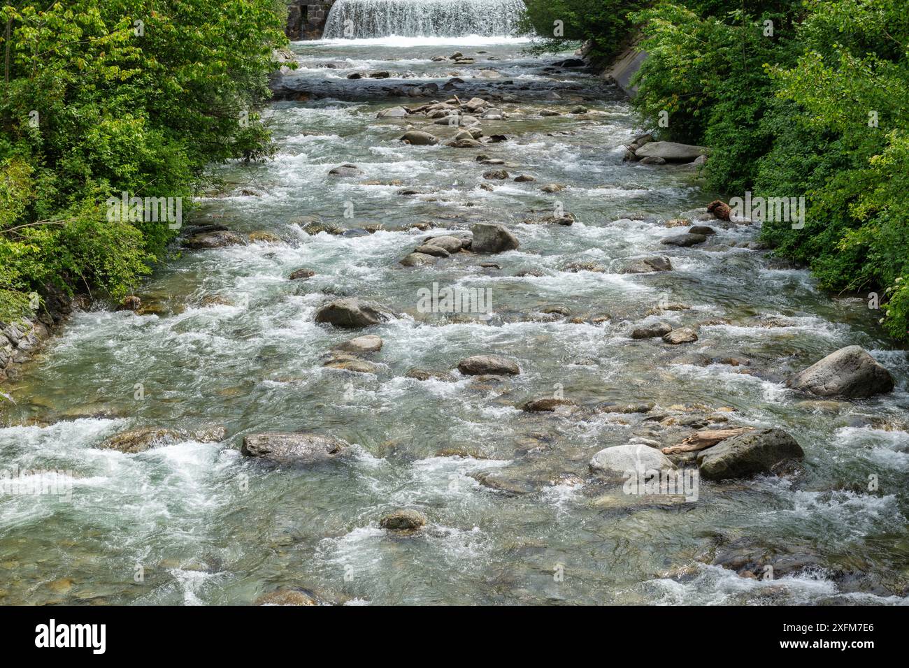 Stream flowing through mountain hi-res stock photography and images - Alamy