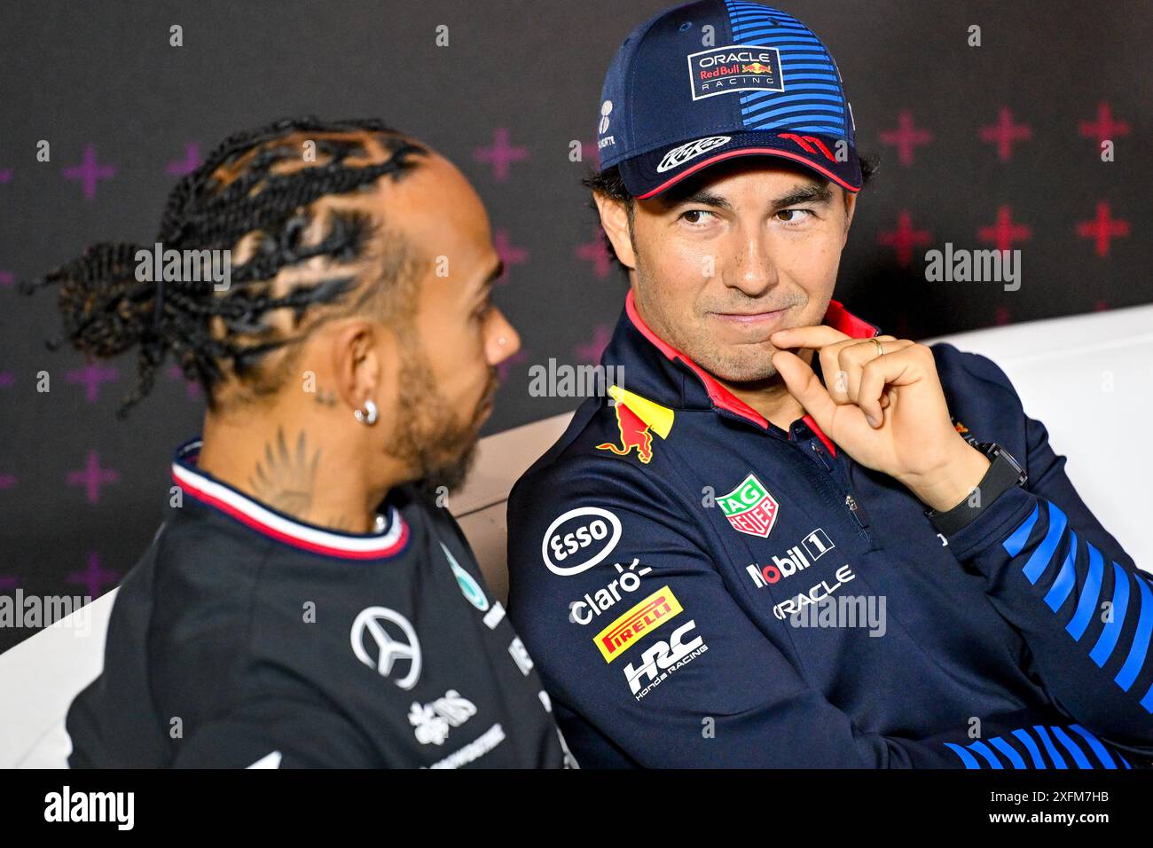 Towcester, UK, 04 July 2024. Drivers press conference with Lewis Hamilton (L) Sergio Perez (R ...