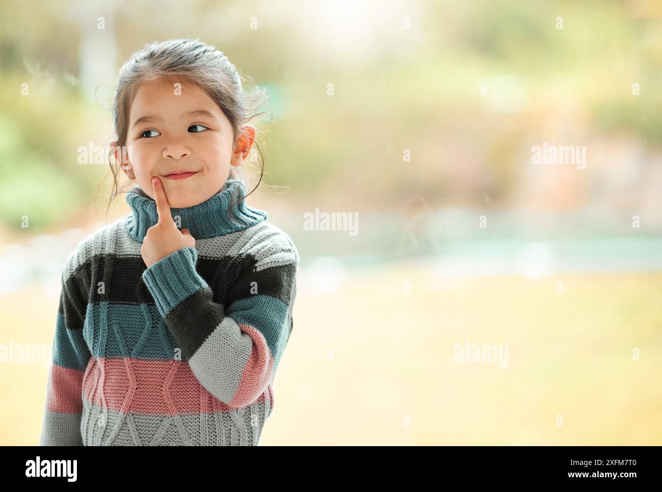Girl child, thinking and smile in outdoor with mockup, blurred ...
