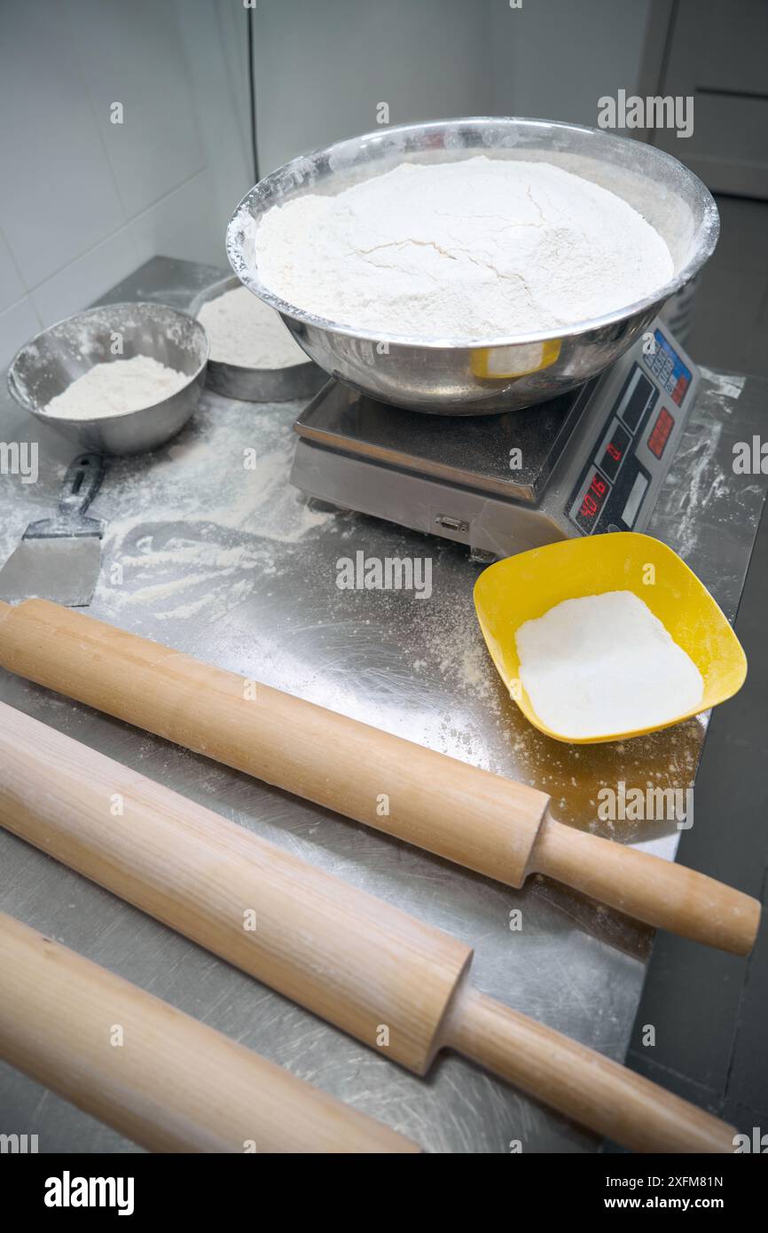 Kitchen workers workplace with a metal work surface Stock Photo - Alamy
