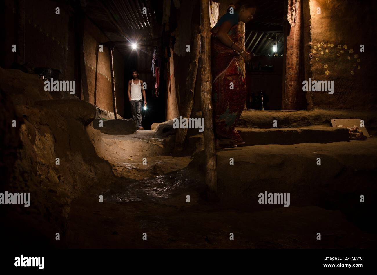 Man walking through urban alley. Aarey Milk Colony in unofficial buffer ...