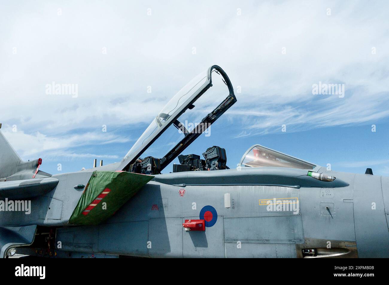 A Panavia Tornado jet fighter stands with cockpit open in the display ...