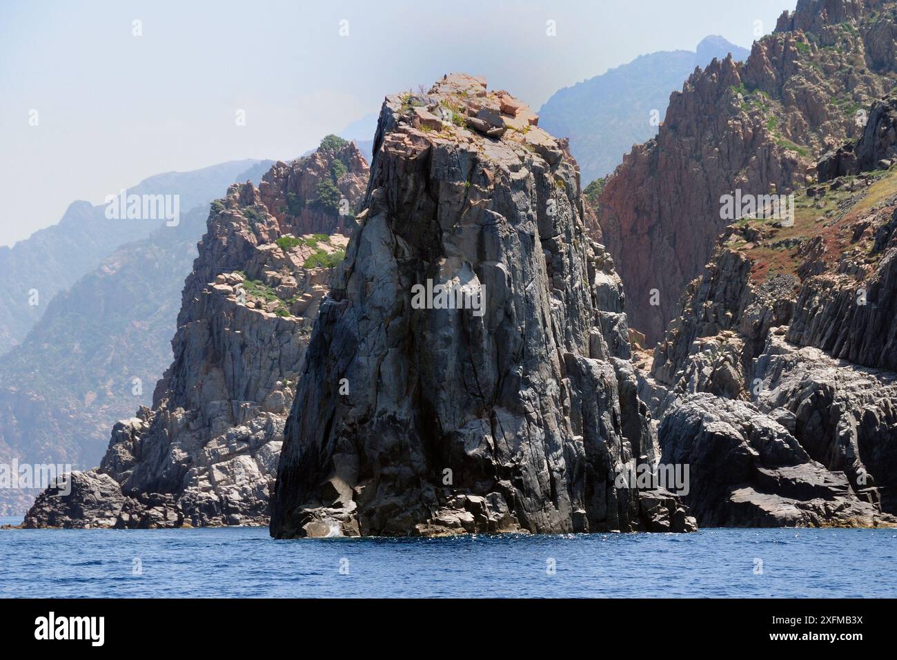 Spiky eroded granite pinnacles of Cap Rosso within a UNESCO World ...