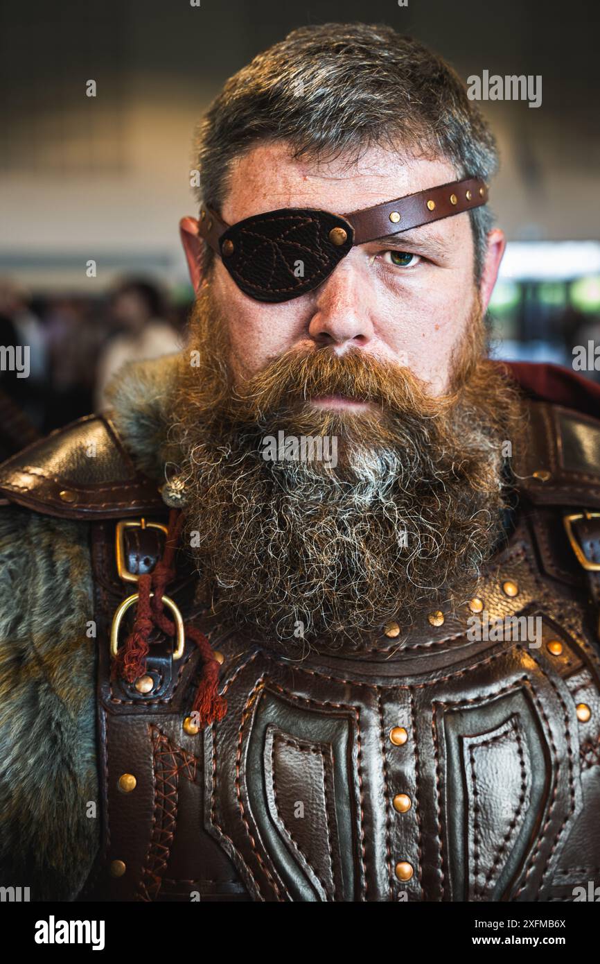 Head and shoulders portrait of a tough and strong male cosplayer ...