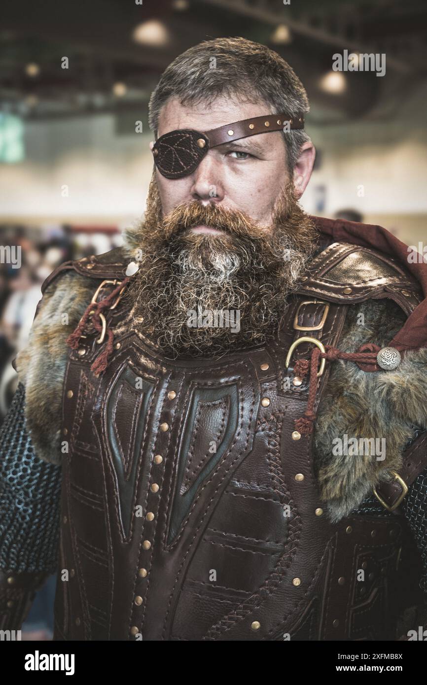 Head and shoulders portrait of a tough and strong male cosplayer ...