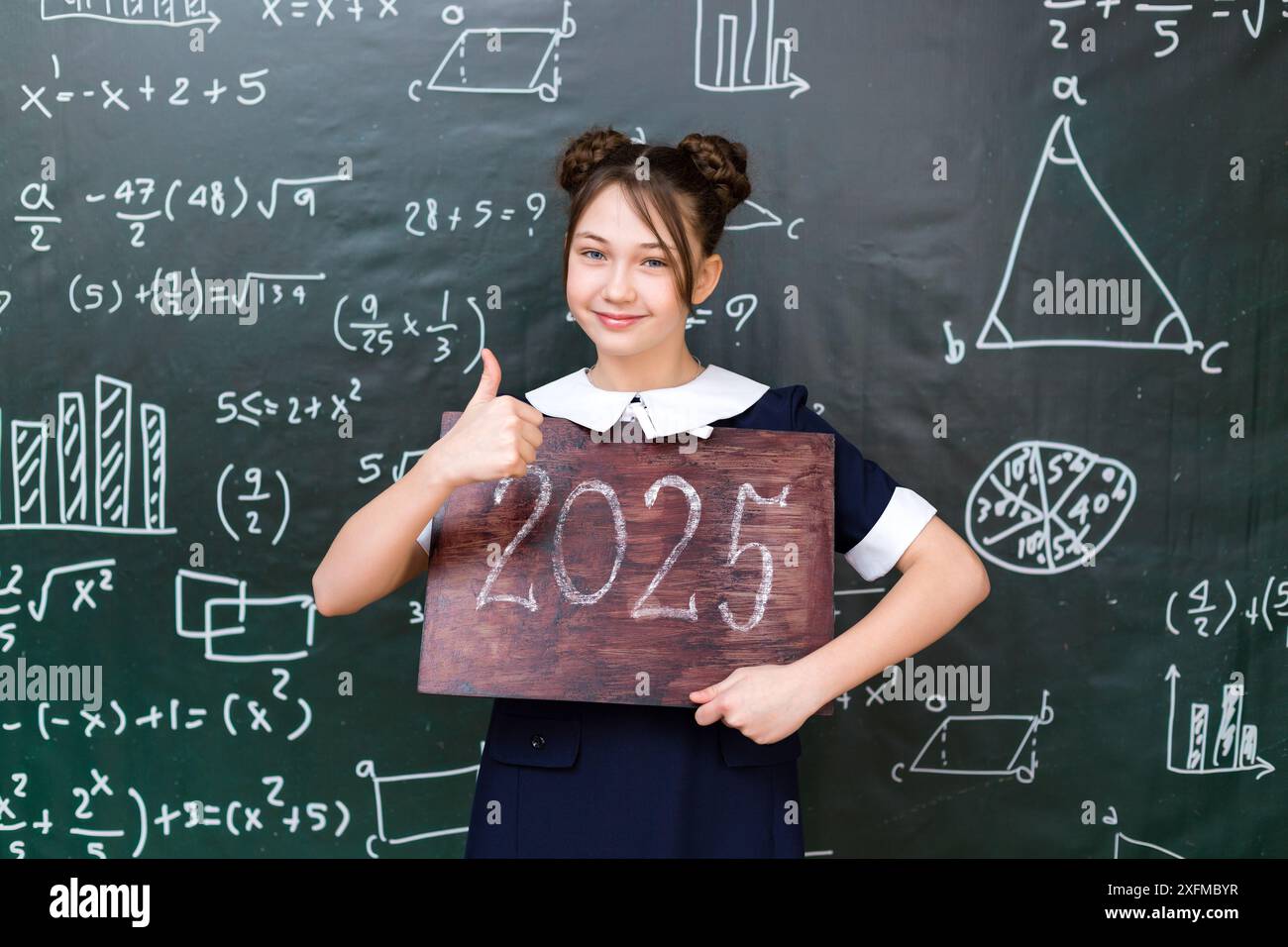 Back to school 2025 school year, schoolgirl holding sign near the ...