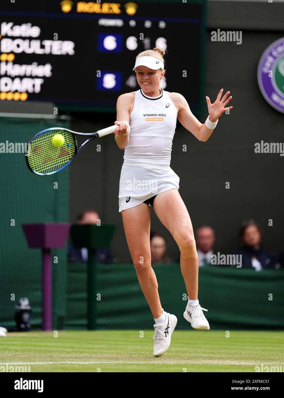Harriet Dart in action against Katie Boulter (not pictured) on day four ...