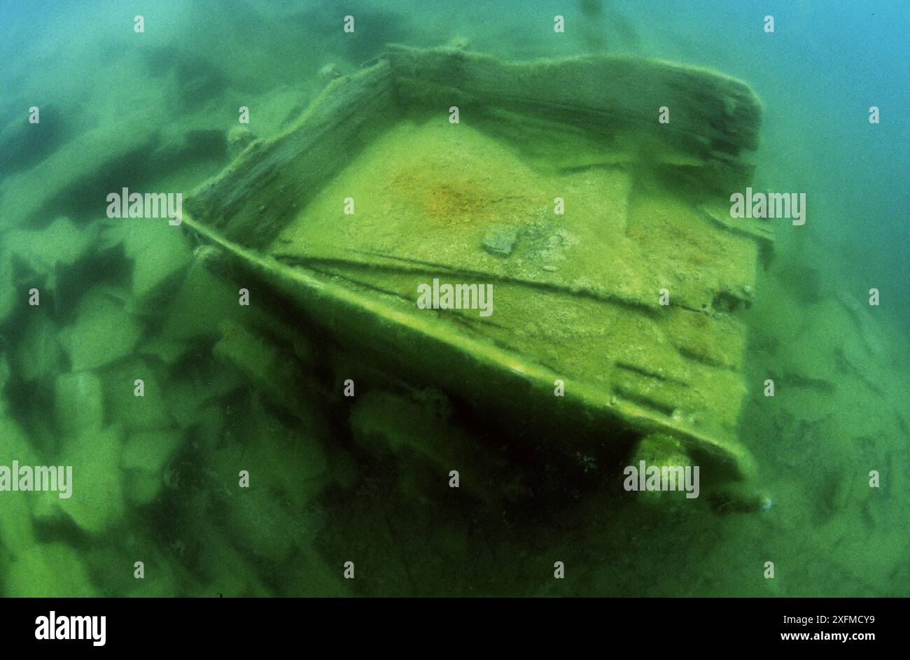 Mine cart in flooded slate quarry on Belnahua island. Scotland. 1996 ...