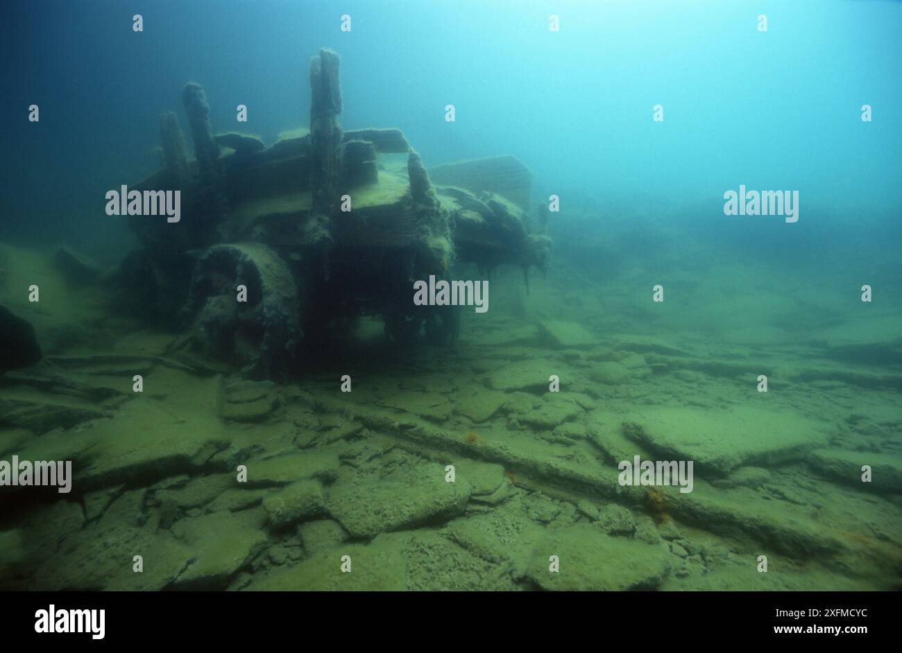 Mine cart in flooded slate quarry on Belnahua island. Scotland. 1996 ...