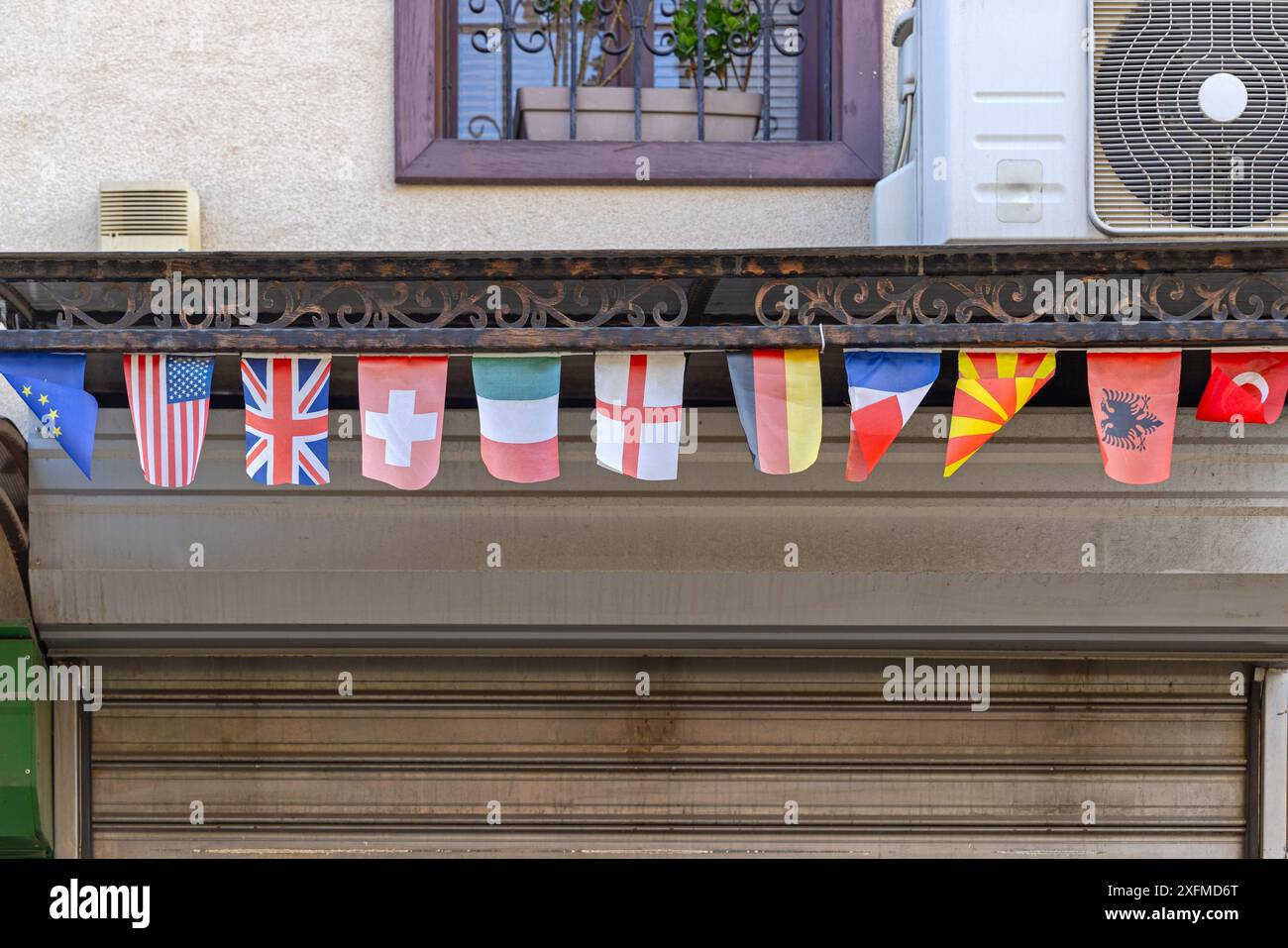 International Flags String in Front of Shop World Travel Agent Stock ...