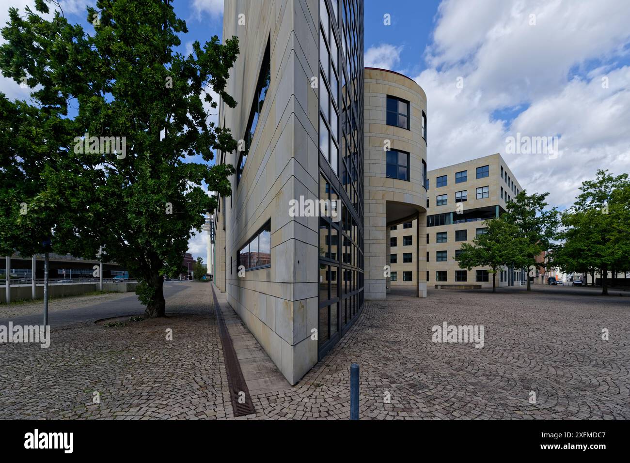 Split view on two areas of an extrermly pointy building in Hanover city ...