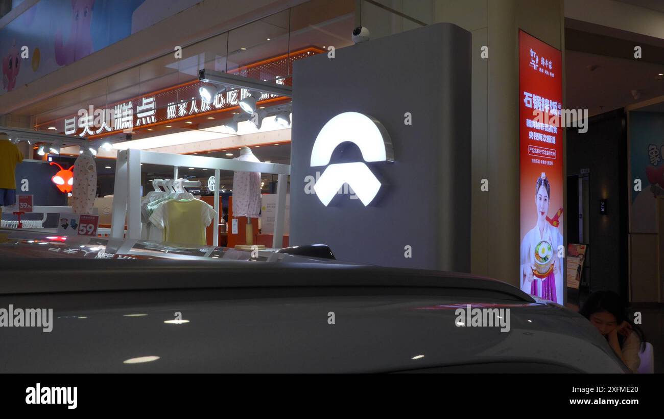 A logo of Chinese multinational automobile manufacturer, NIO seen at ...