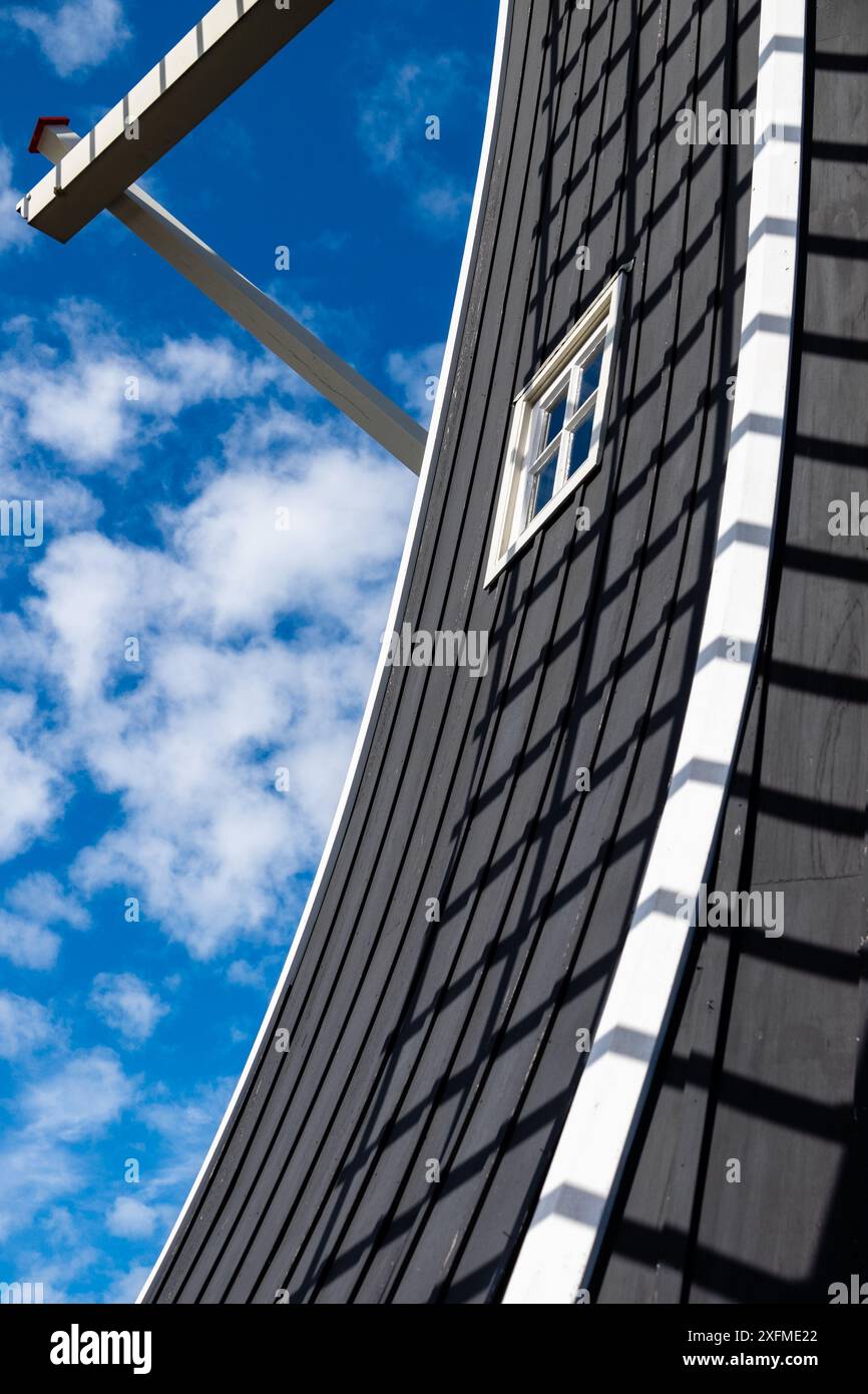 A large windmill with a window on the side Stock Photo - Alamy