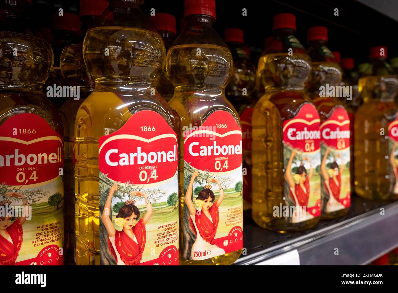 Bottles from the Spanish cooking oil and olive oil brands Carbonell ...