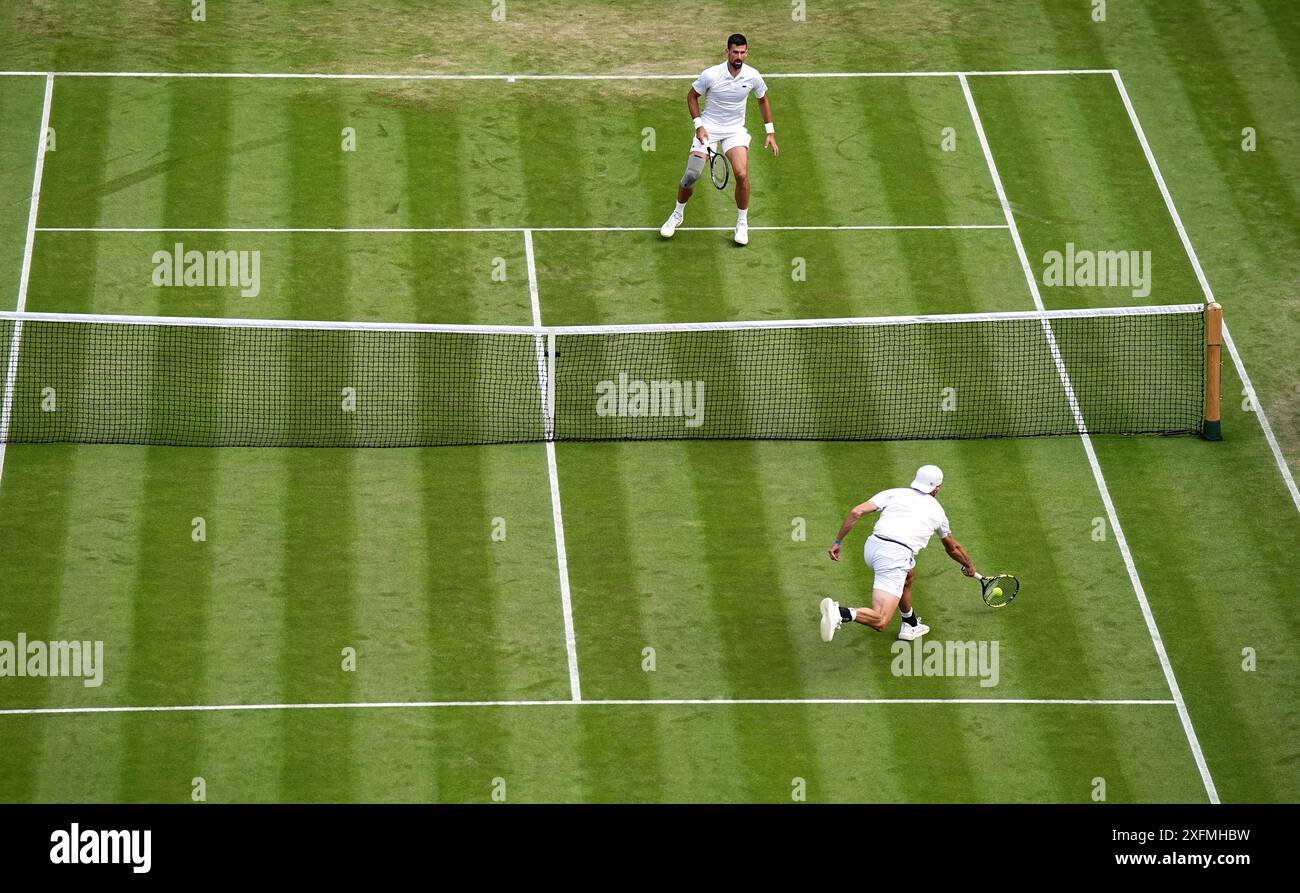 Jacob Fearnley in action against Novak Djokovic (top) on day four of ...