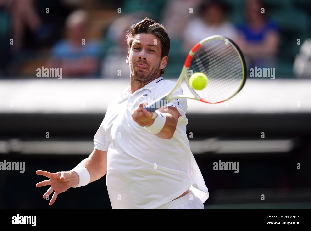 Cameron Norrie in action against Jack Draper (not pictured) on day four ...