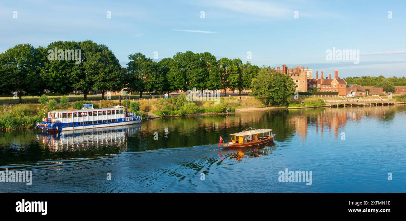 Boats on the Thames at Hampton Court palace, near London Stock Photo ...