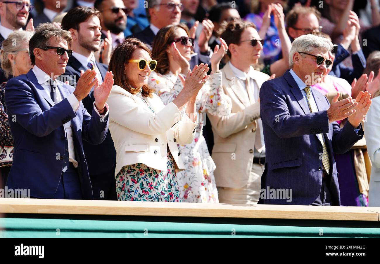 Carole and Michael Middleton with Lord Sebastian Coe in the royal box ...