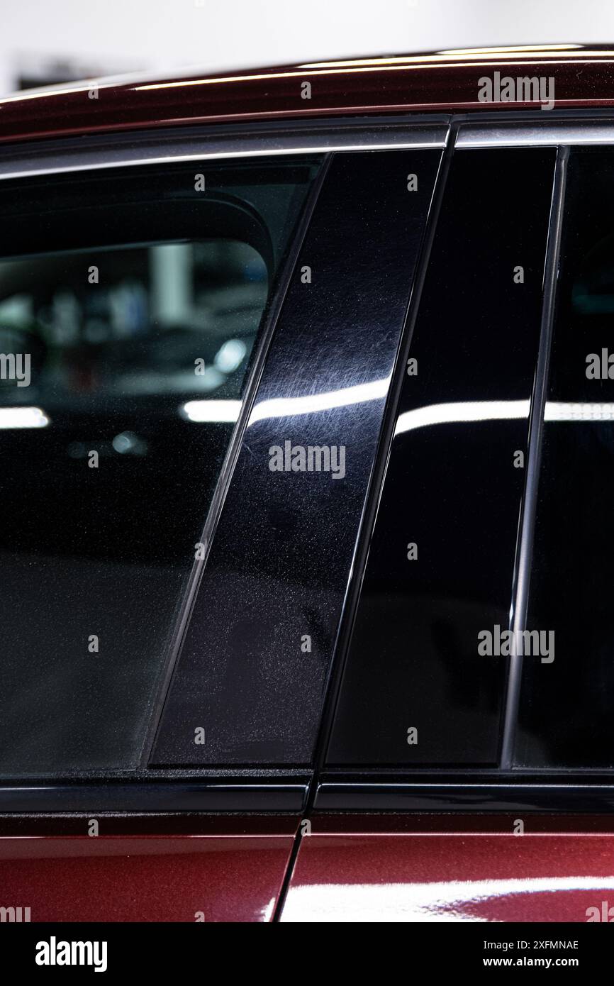 Comparison of a car's pillar showing the effect before and after paint ...