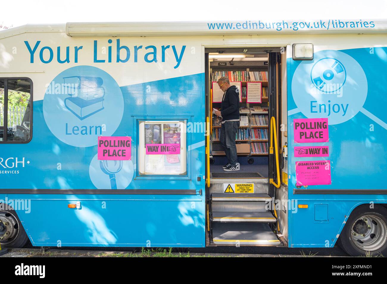 The public in Drumbrae come to cast their vote in a mobile library, as ...