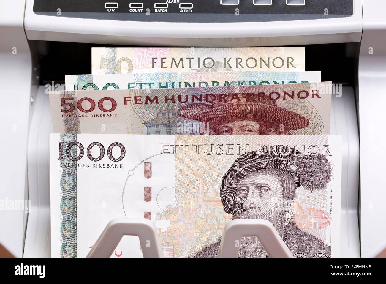 Old Swedish crown - krona in the counting machine Stock Photo - Alamy