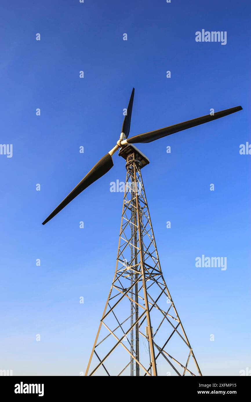 An early style of wind tubine mounted on a steel frame tower Stock ...