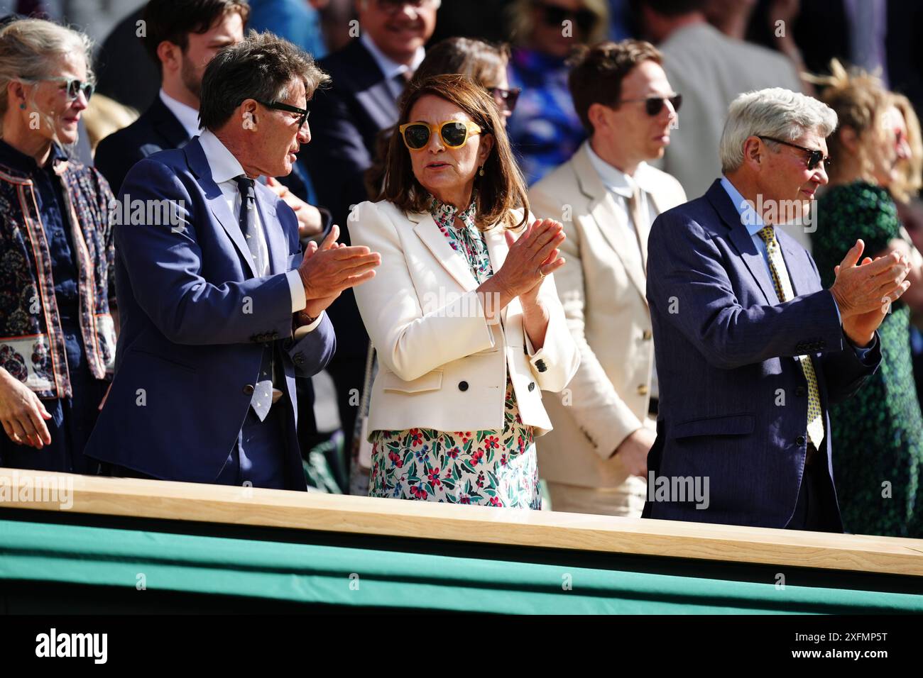 Carole and Michael Middleton with Lord Sebastian Coe in the royal box ...