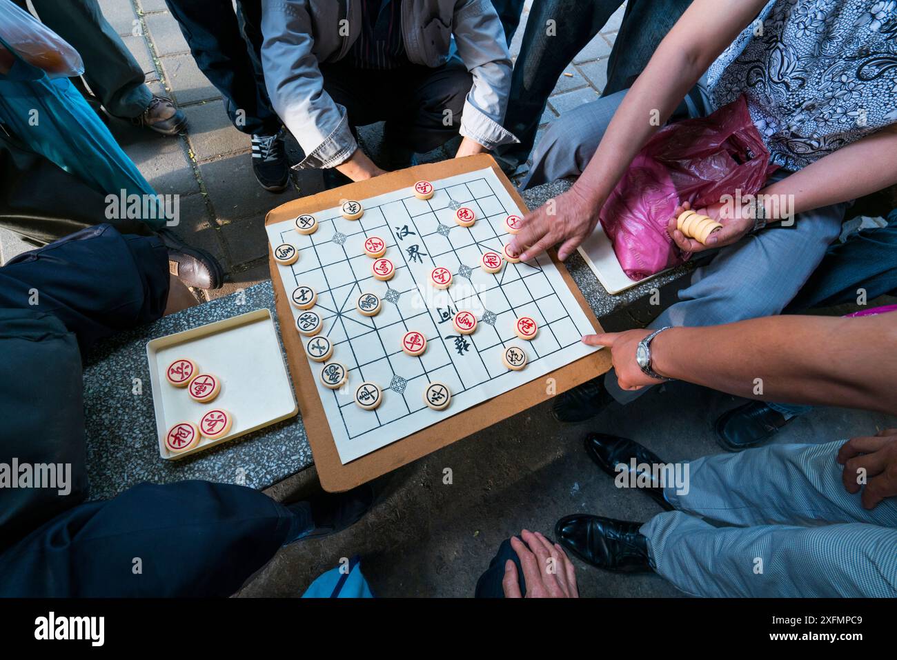 People playing Xiangqi, also called Chinese chess, Green, Lake Park ...