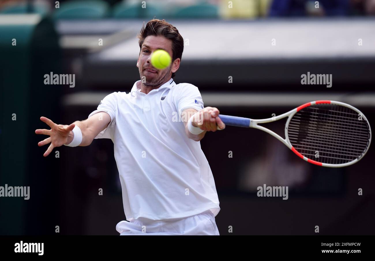 Cameron Norrie in action against Jack Draper (not pictured) on day four ...
