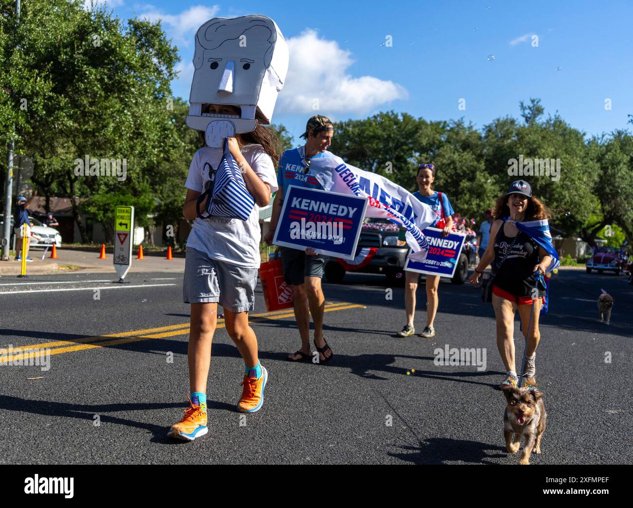 Austin Texas USA, July 4, 2024. A woman wearing a caricature mask ...
