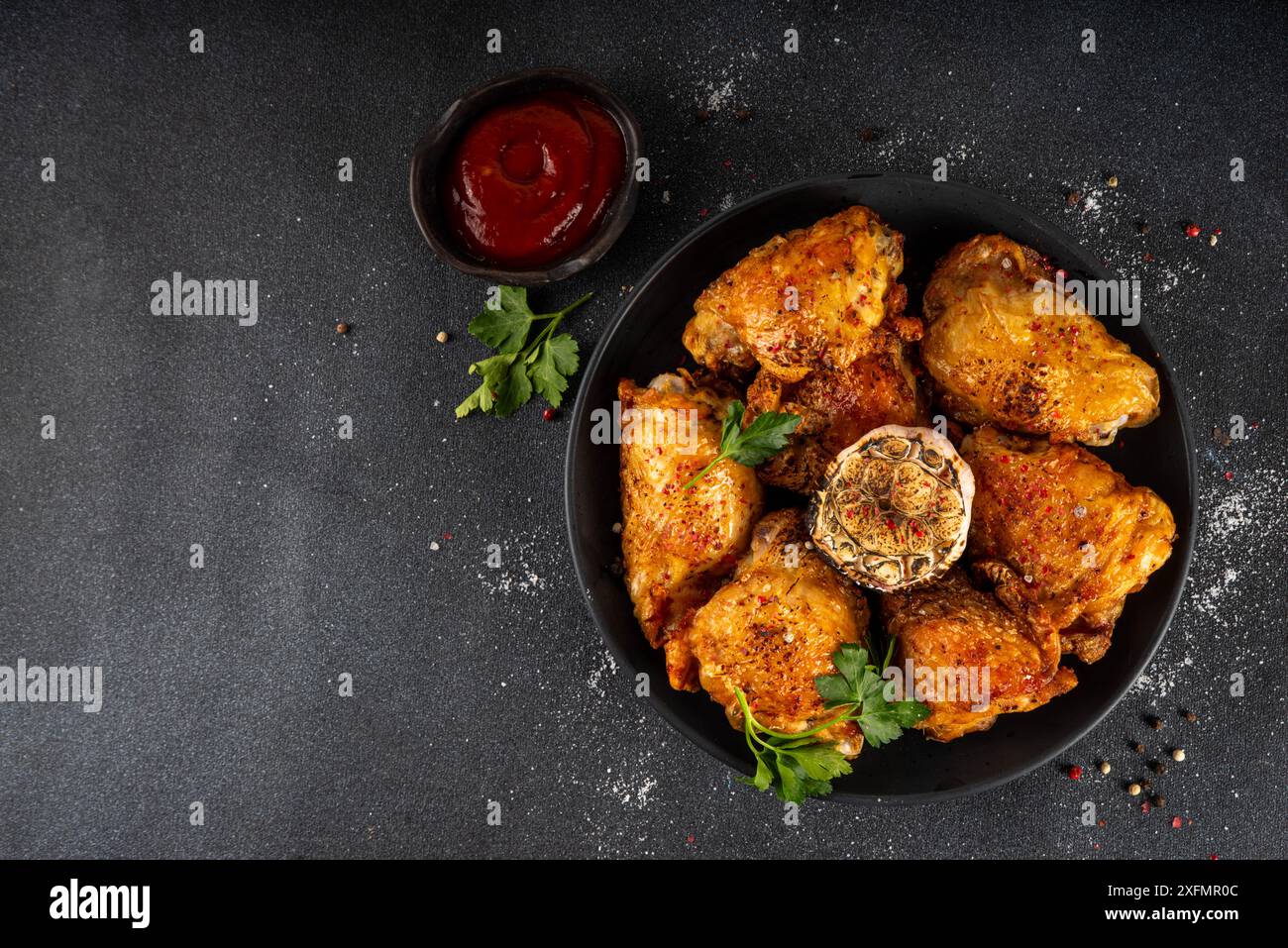 Grilled bbq roasted spicy chicken thigh with ketchup sauce and ...