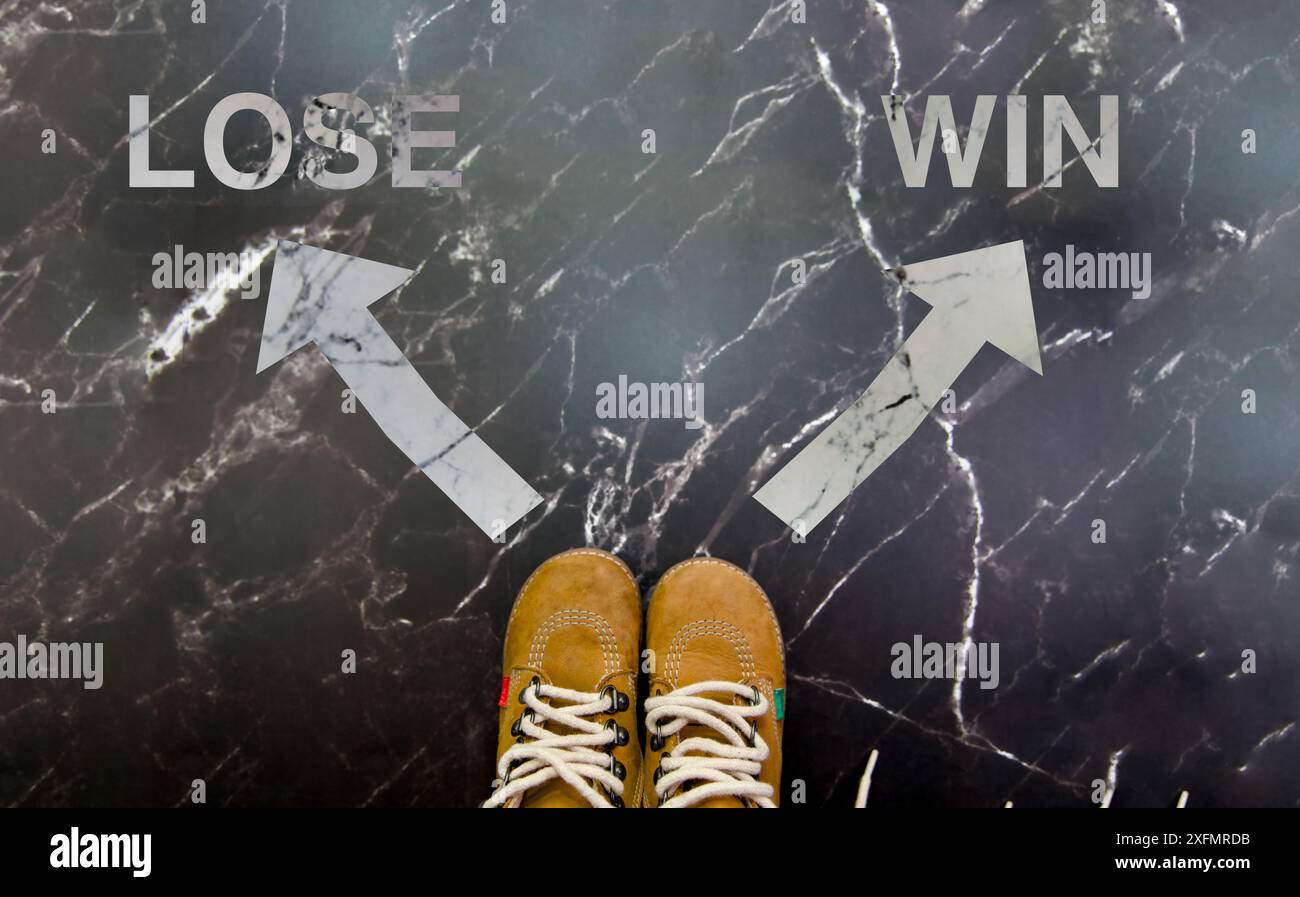 Person standing between arrows labeled 'lose' and 'win' on a marble ...