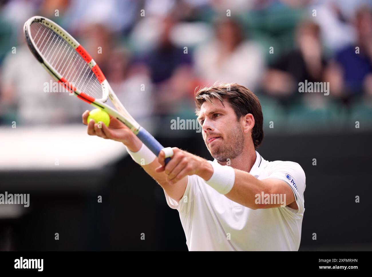 Cameron Norrie in action against Jack Draper (not pictured) on day four ...