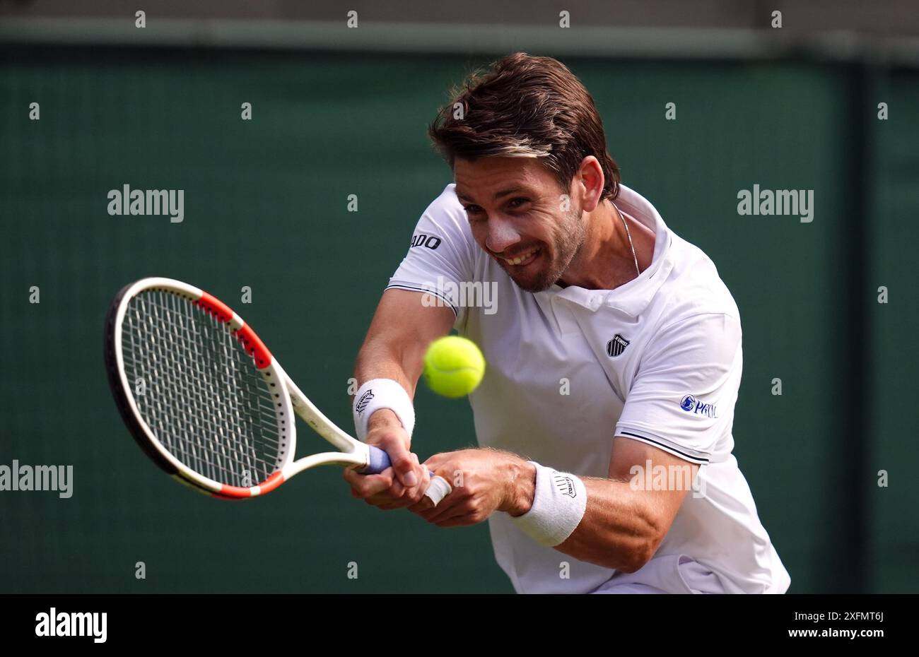 Cameron Norrie in action against Jack Draper (not pictured) on day four ...