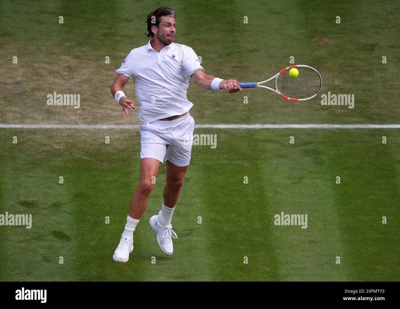 Cameron Norrie in action against Jack Draper (not pictured) on day four ...