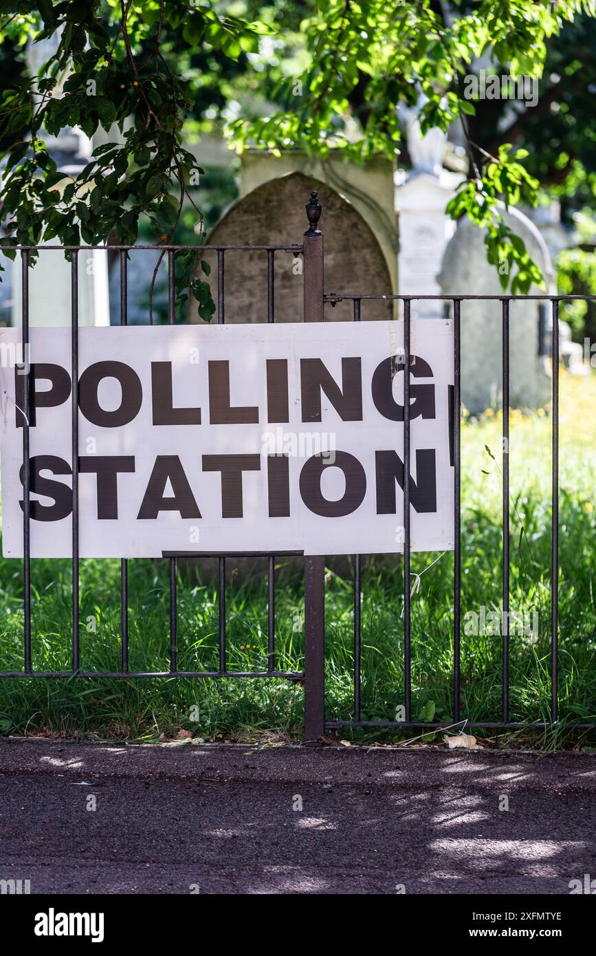 Polling station sign in a church graveyard in St John's Southend ...