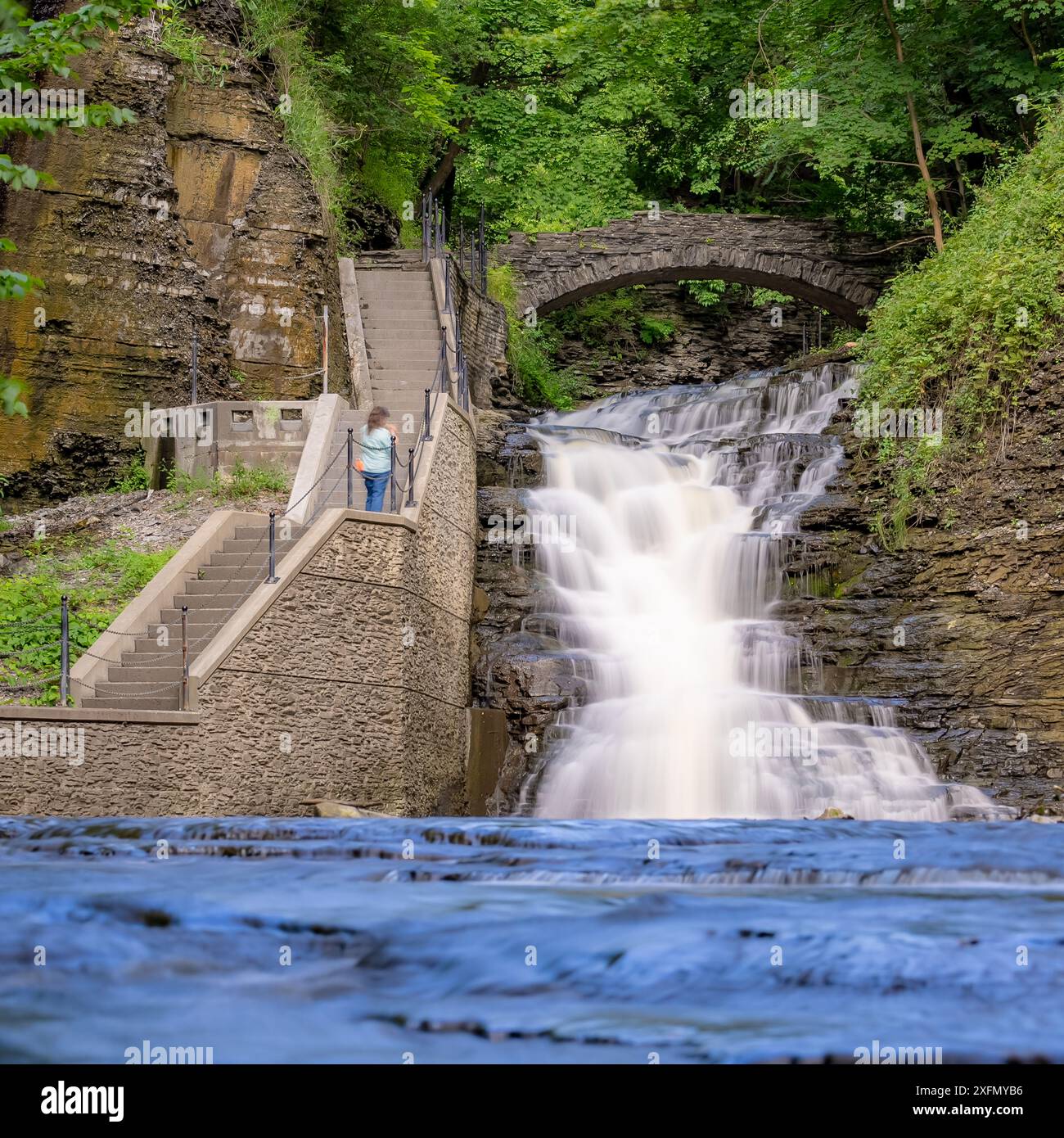Photo of a waterfall with a trail / concrete stairs, Cascadilla Gorge ...
