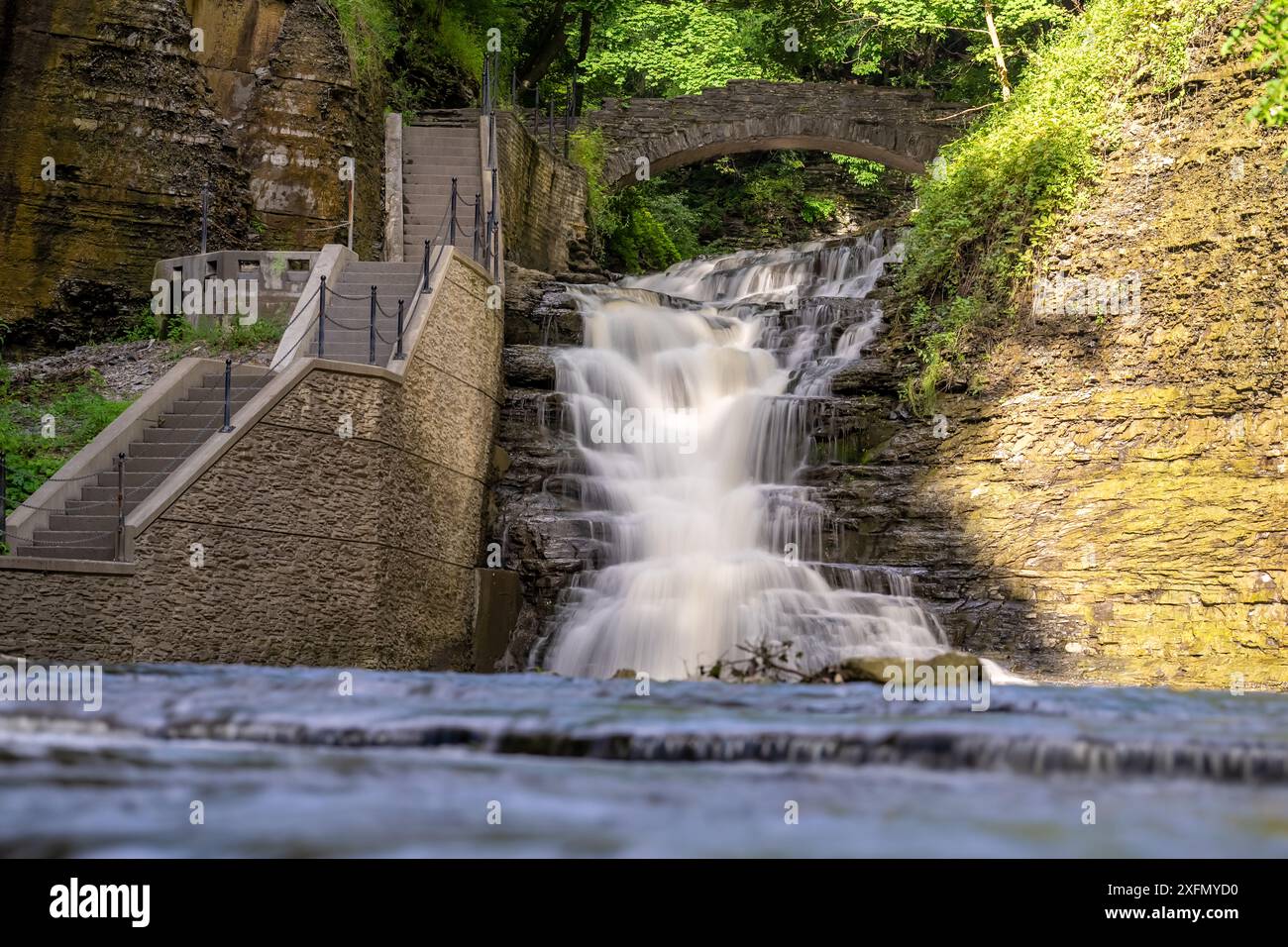 Photo of a waterfall with a trail / concrete stairs, Cascadilla Gorge ...