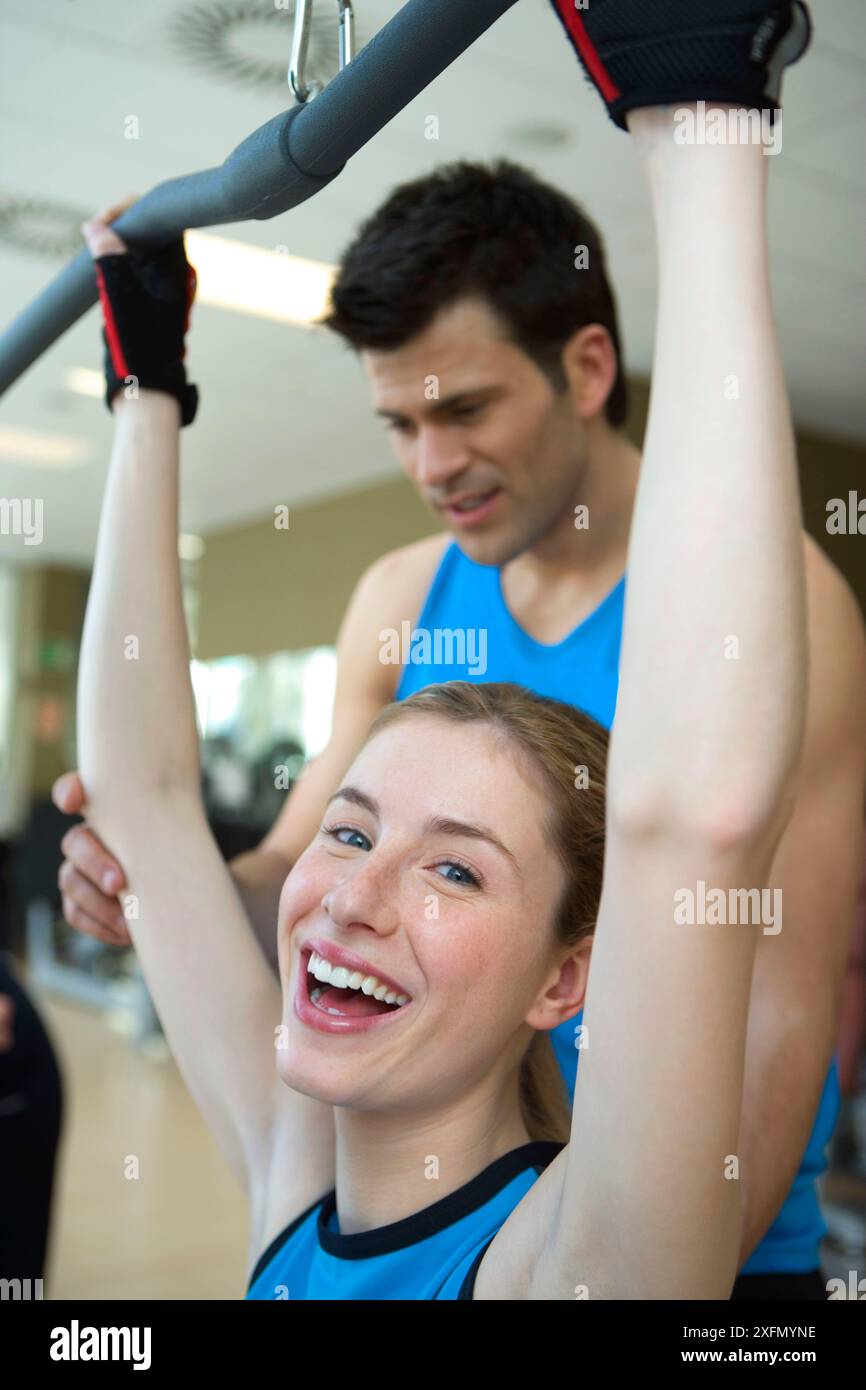 Man using weight machines in hi-res stock photography and images - Alamy