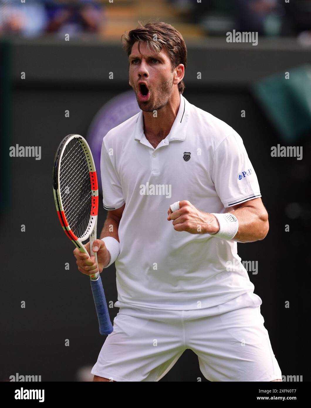 Cameron Norrie celebrates breaking serve in the first game of the ...