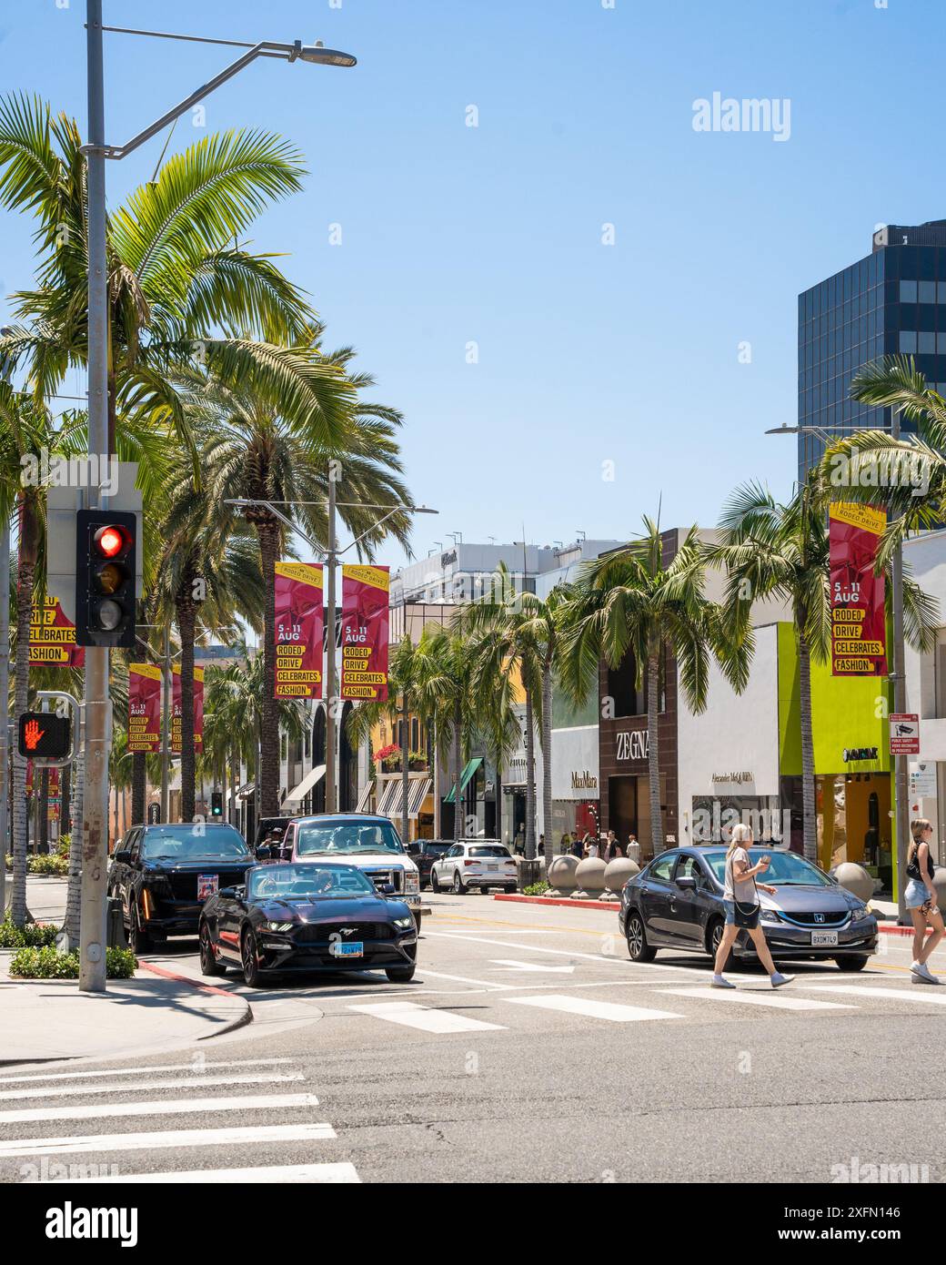 Street scene on Rodeo Drive in Beverly Hills California with people and ...
