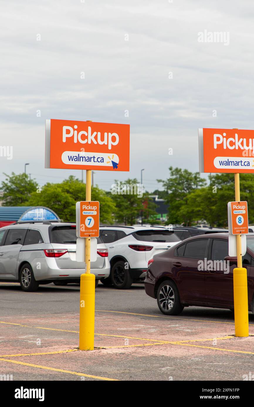 Kanata, Canada - June 2, 2024: Walmart pickup signs. Parking spot for ...