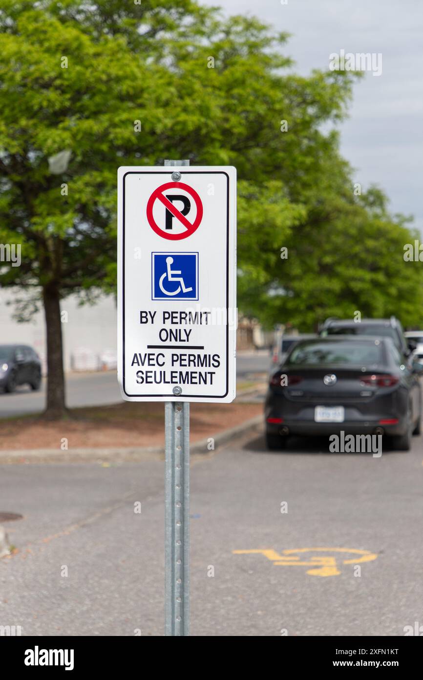 Kanata, Canada - June 2, 2024: Parking spot by permit only for people ...