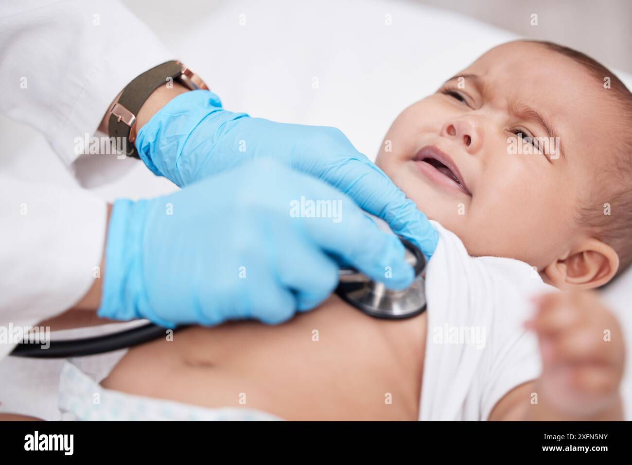 Baby, doctor and stethoscope for crying and heartbeat, checkup and ...