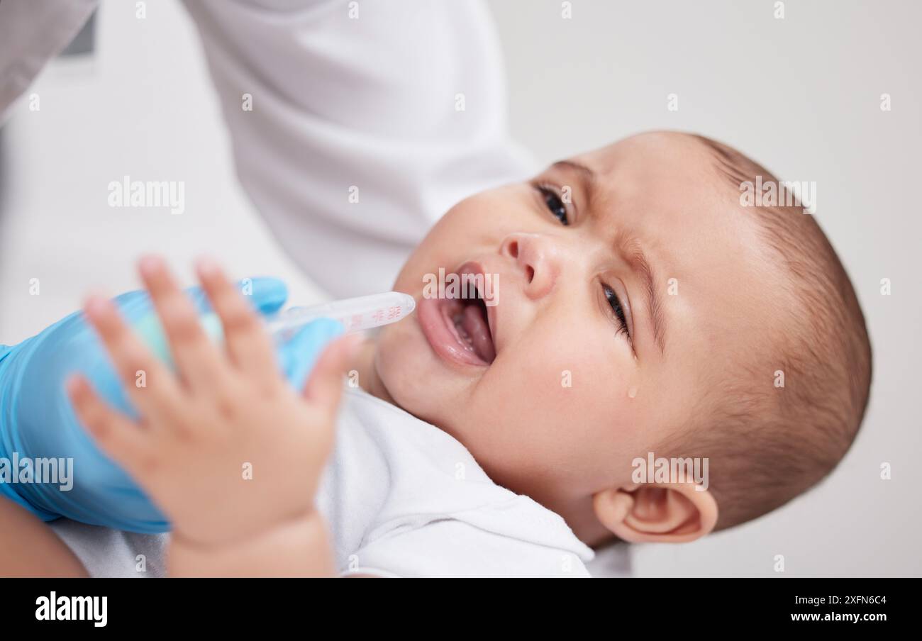 Baby, doctor and medication in hospital, syringe and sickness for ...