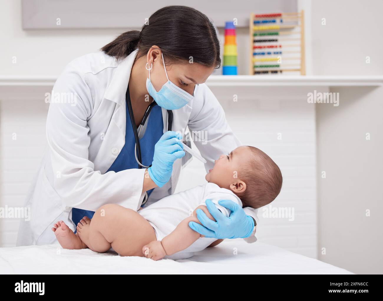 Baby, doctor and fever for thermometer in hospital, bed and lungs for ...