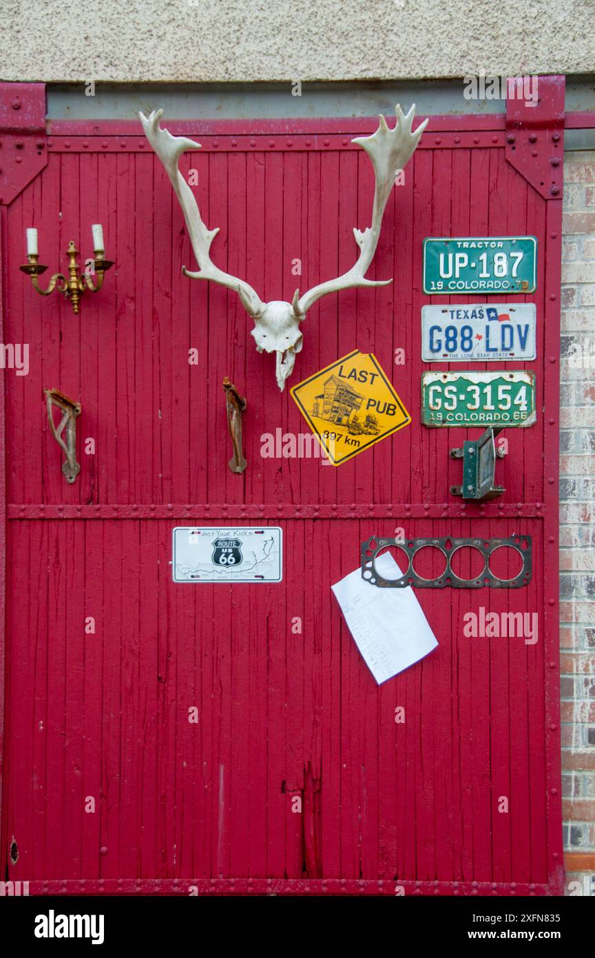 Big Red Door with street artwork Stock Photo - Alamy