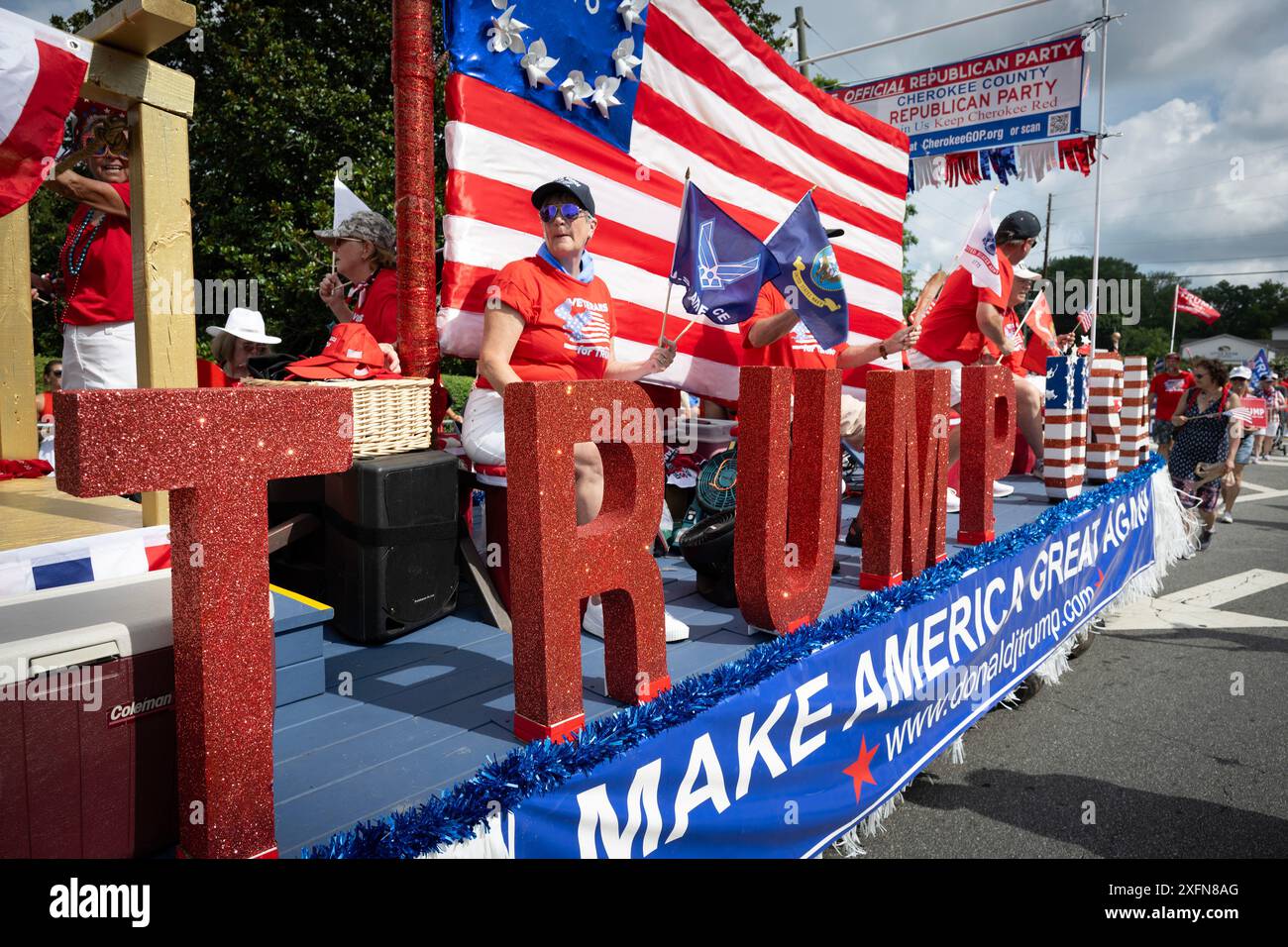 Woodstock, Georgia, USA. 4th July, 2024. Military veterans supporting ...
