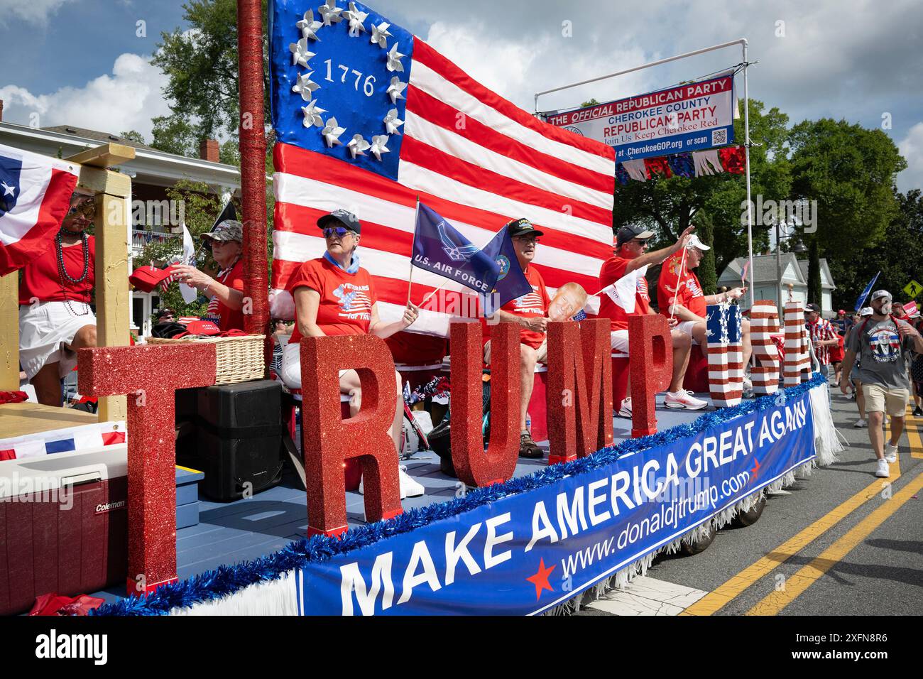 Woodstock, Georgia, USA. 4th July, 2024. Military veterans supporting ...