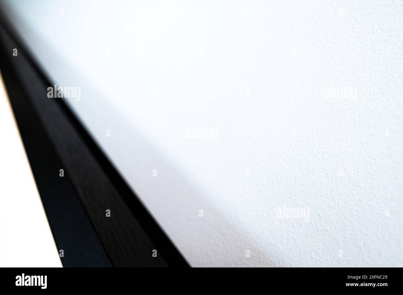 Light and shadows lines on the white and blue wall. Led line, the light ...